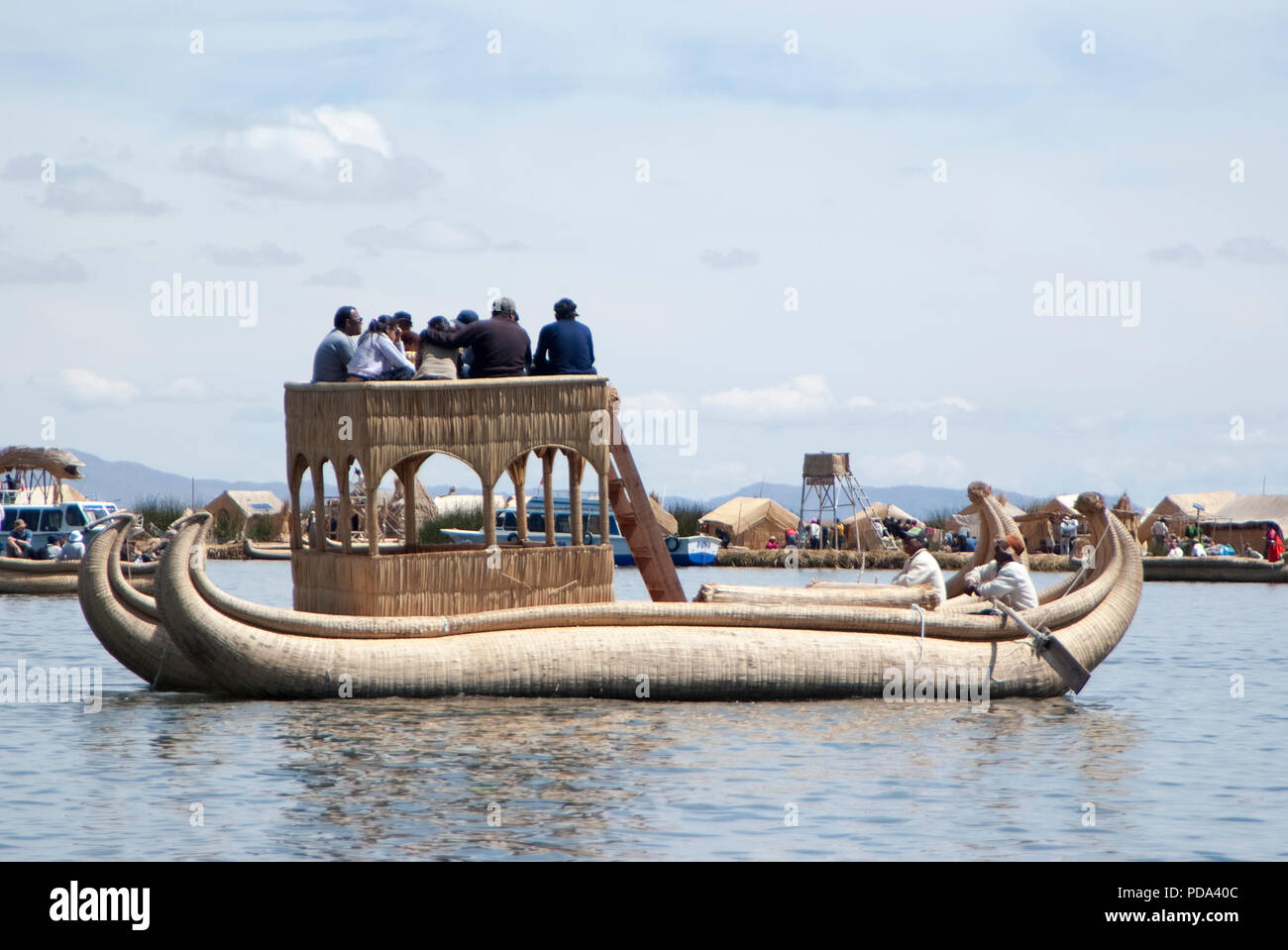 Indians sail by boat. Titicaca lake. Peru Puno Stock Photo - Alamy