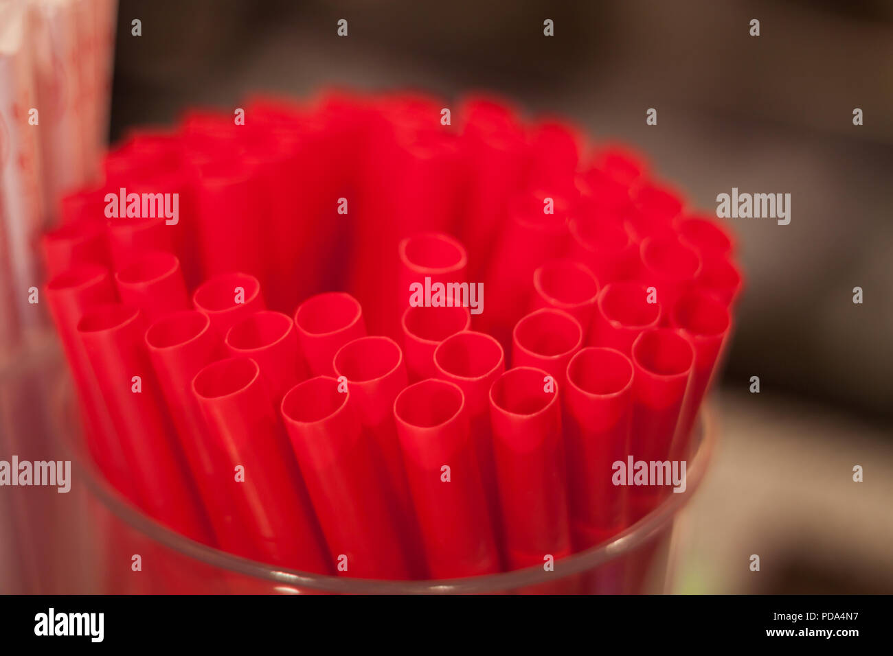 Red straws plastic drinking background, stock photo Stock Photo - Alamy