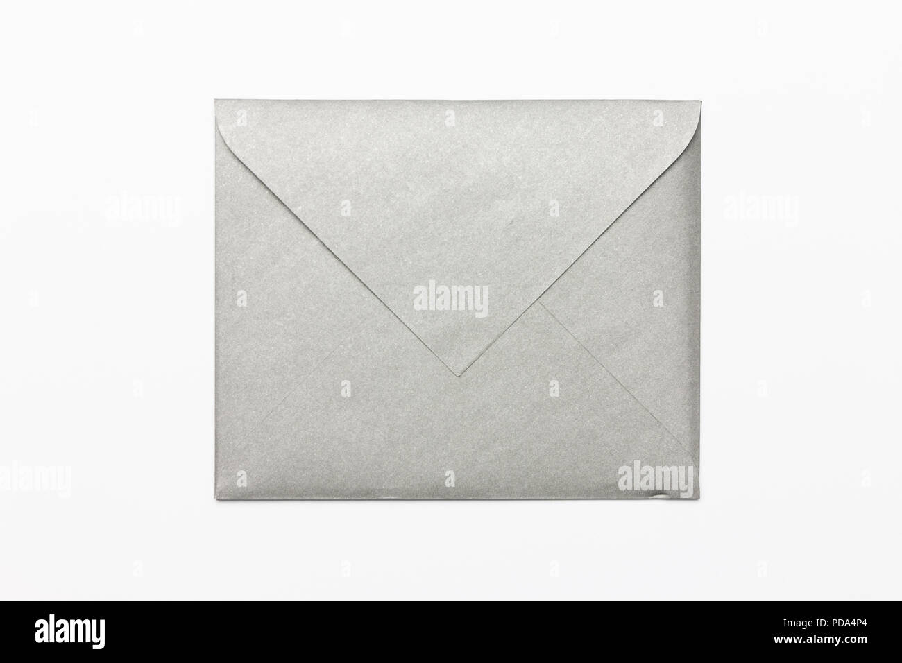 Gray envelope on white background Stock Photo - Alamy