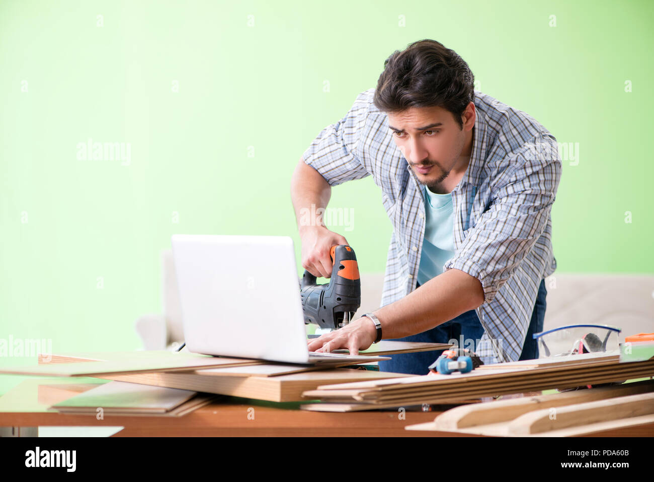 Woodworker working in his workshop Stock Photo - Alamy