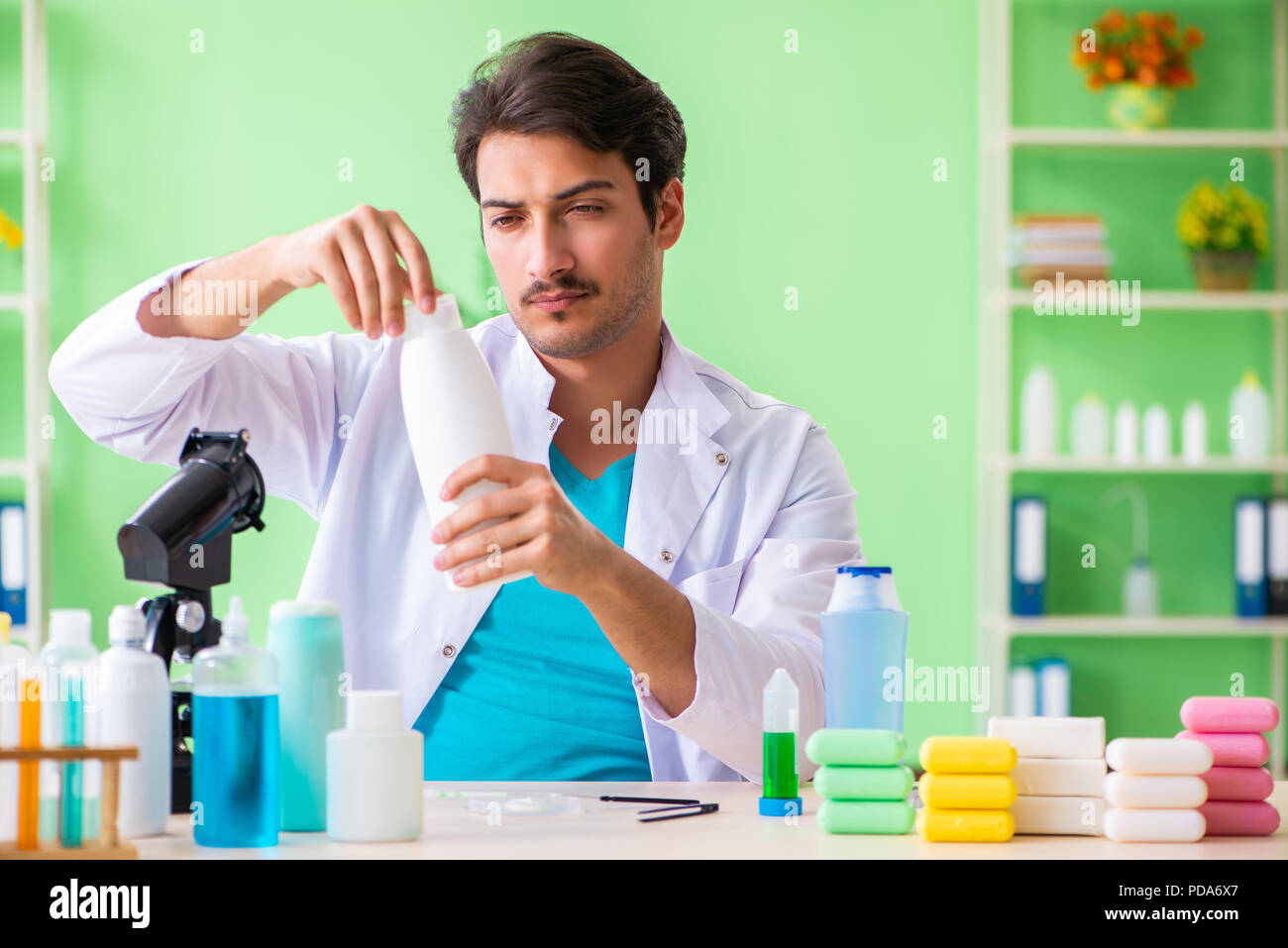 Chemist testing soap in the lab Stock Photo - Alamy