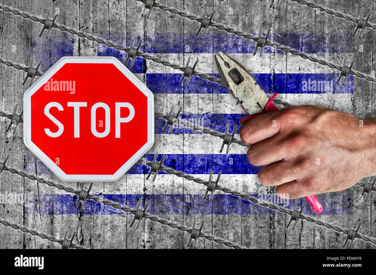 Greece flag, border house and barb wire with pliers Stock Photo - Alamy