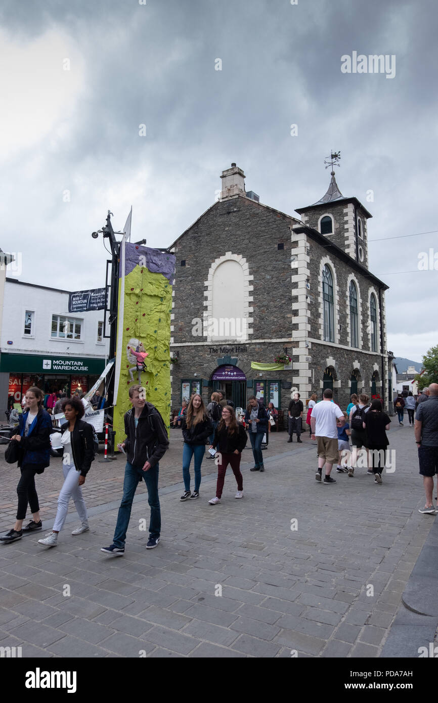 Main Street, the town centre of Keswick, Cumbria, uk with busy shoppers ...