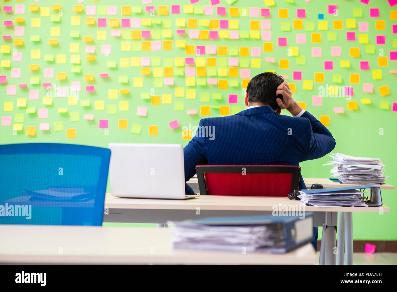 Businessman with many conflicting priorities Stock Photo - Alamy