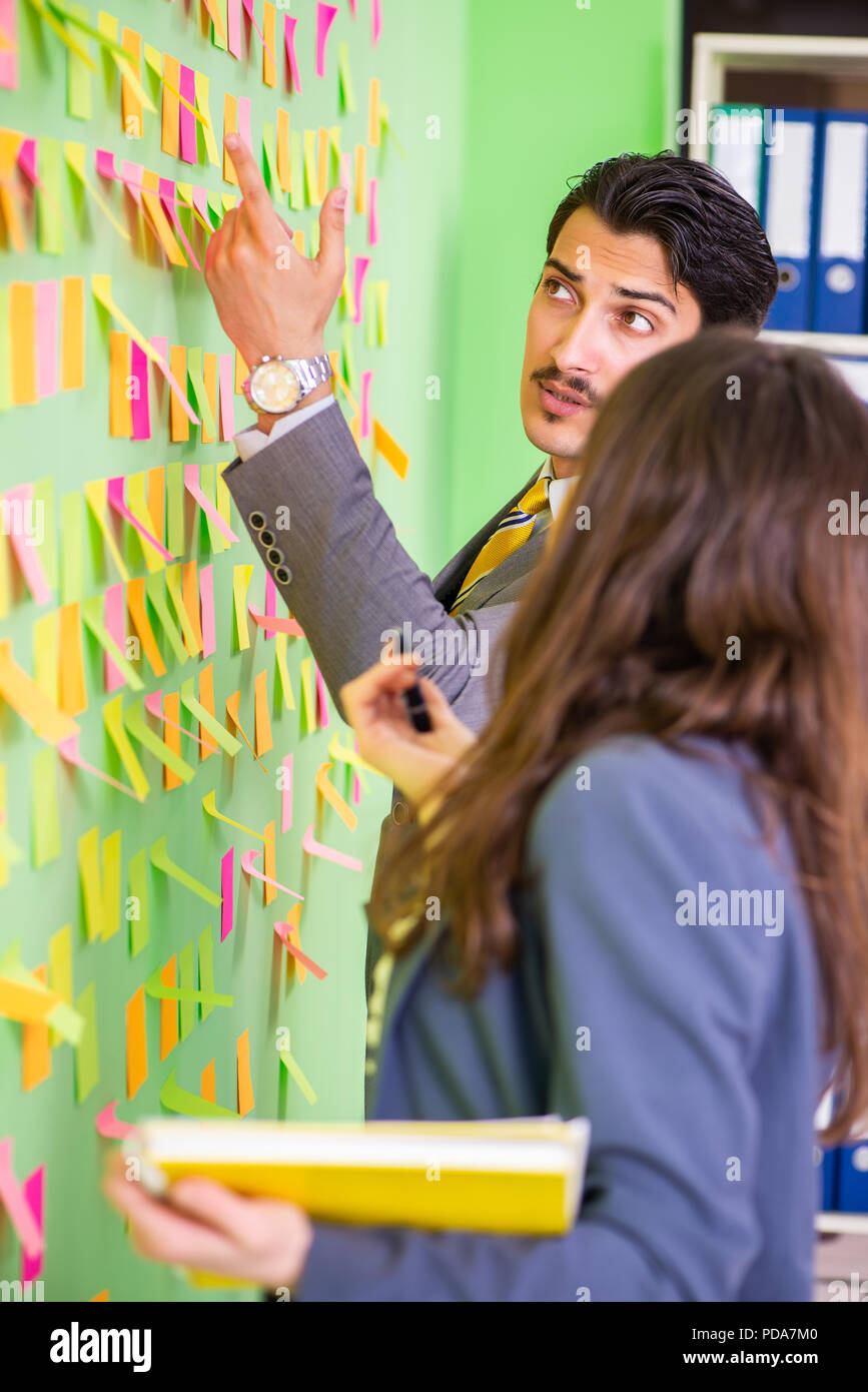 Business colleagues discussing future priorities Stock Photo - Alamy