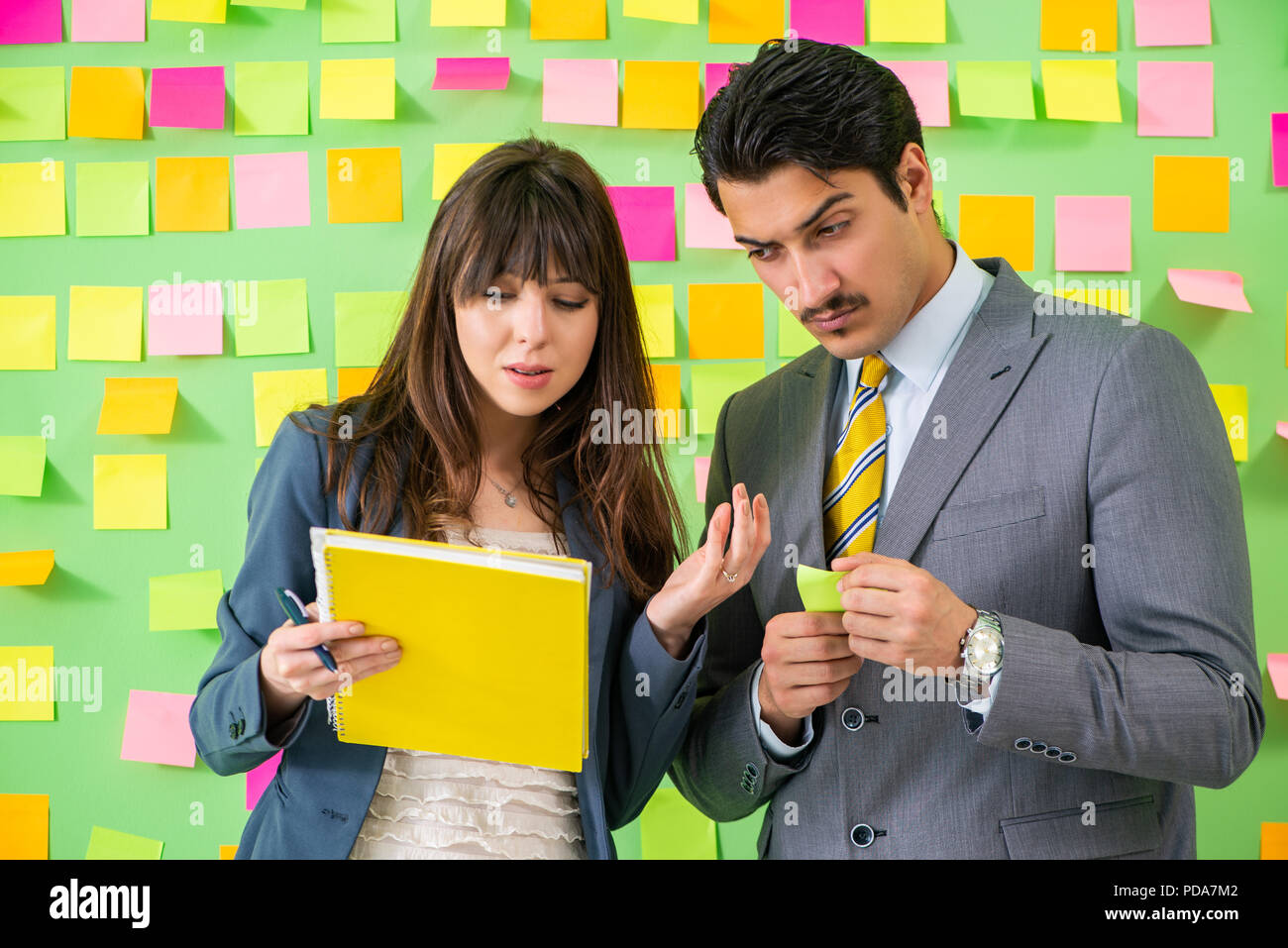 Business colleagues discussing future priorities Stock Photo - Alamy