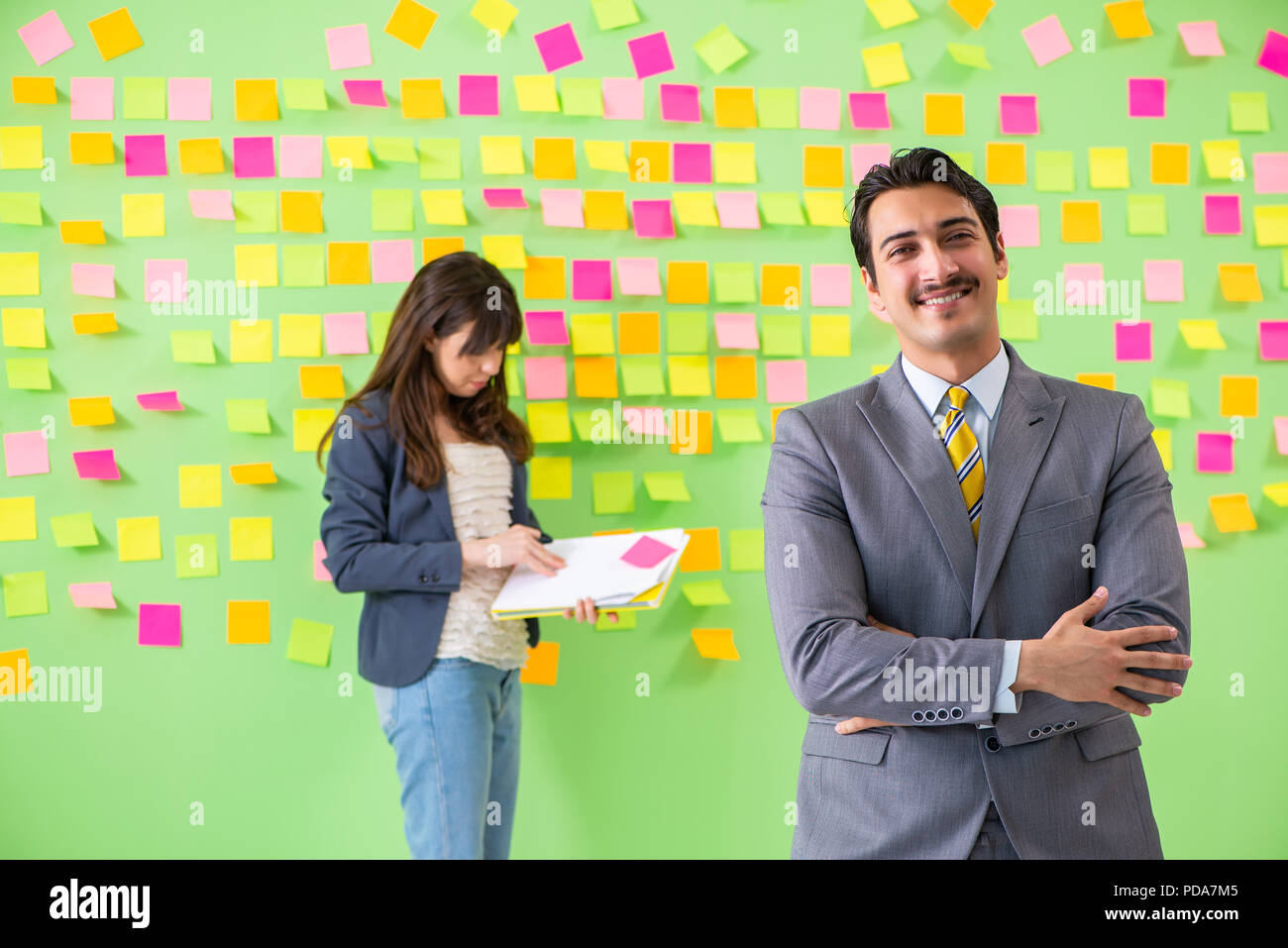 Business colleagues discussing future priorities Stock Photo - Alamy