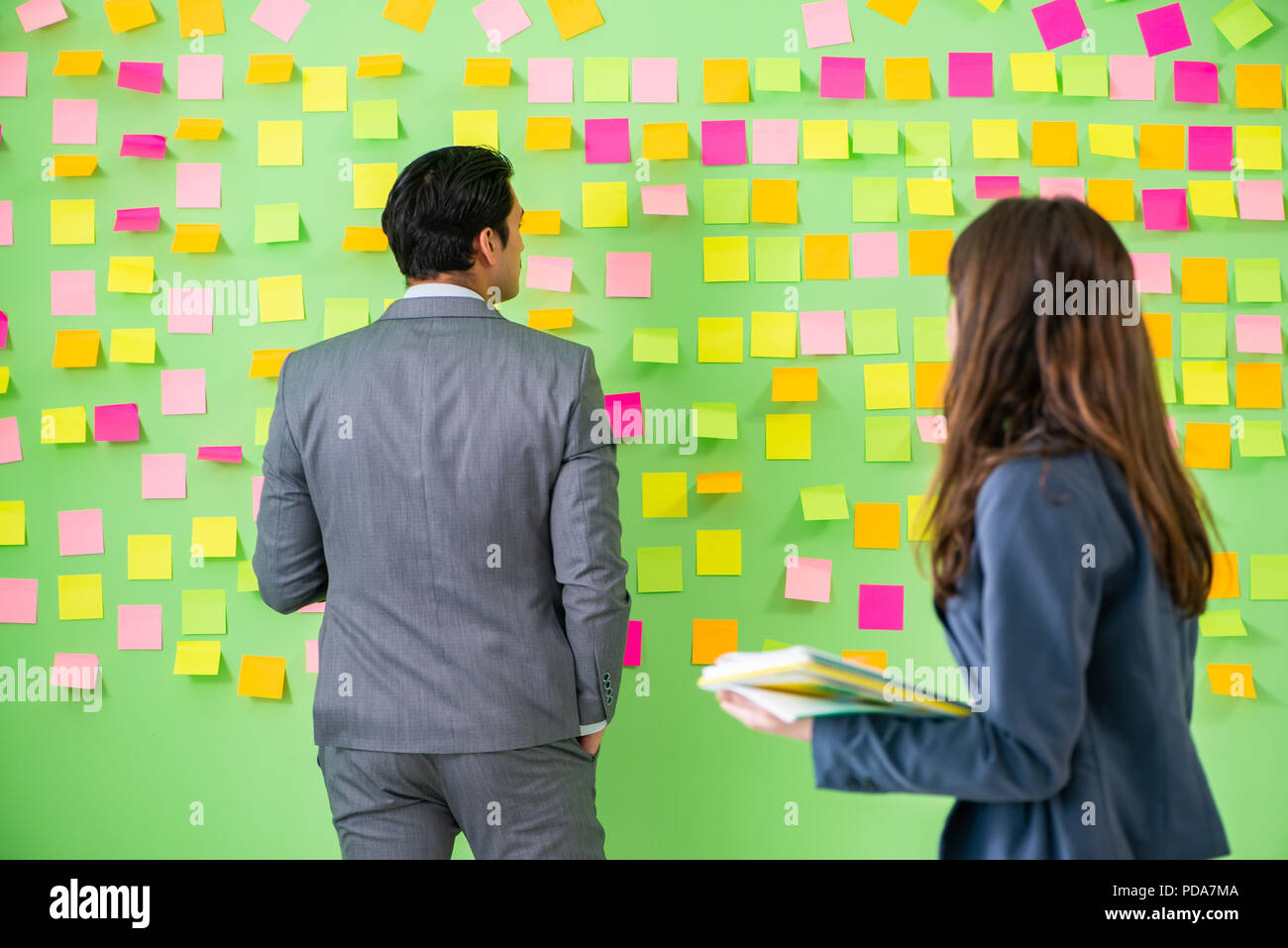 Business colleagues discussing future priorities Stock Photo - Alamy