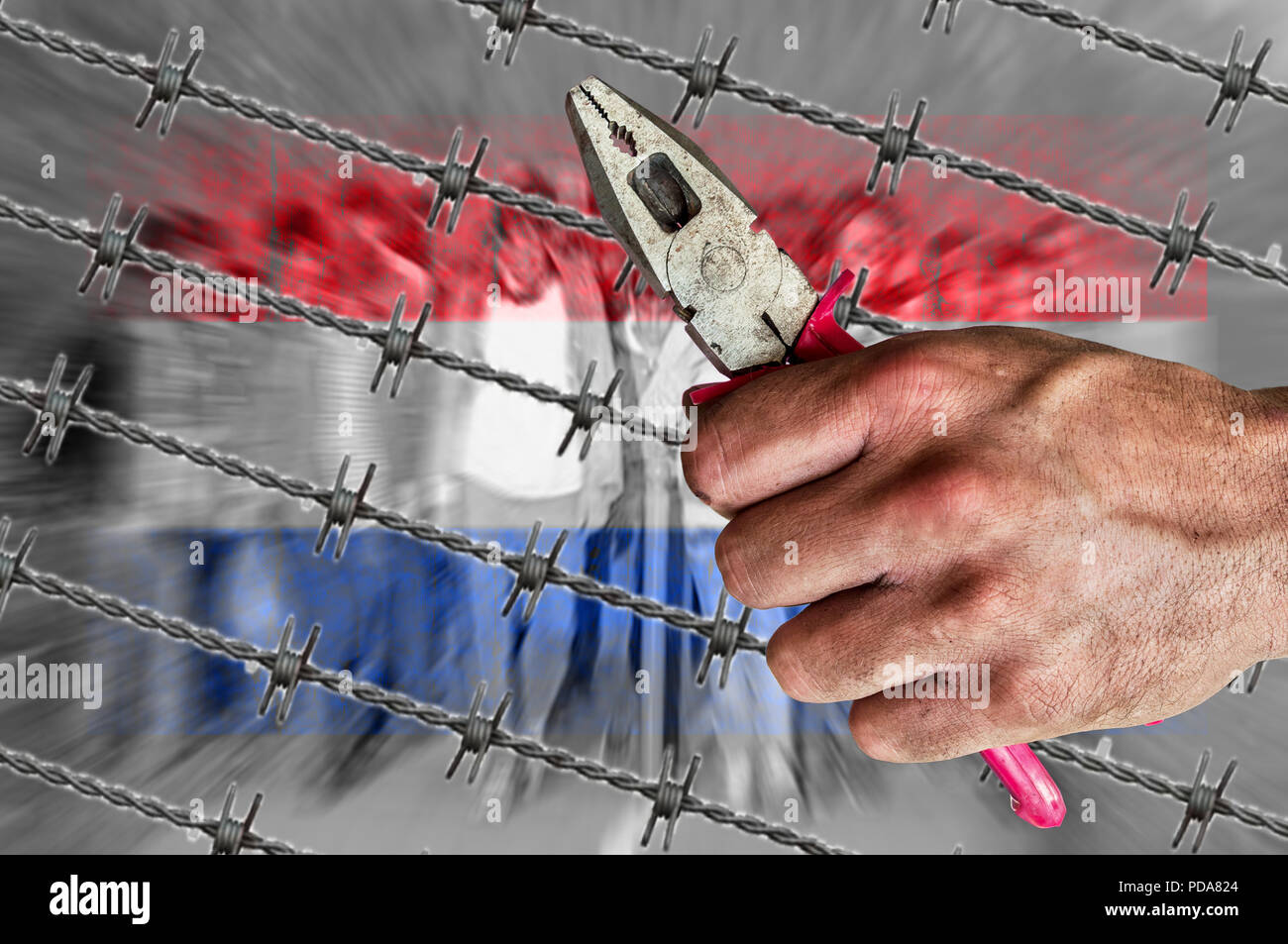 Netherland flag, STOP sign, migrants and barb wire with pliers Stock ...