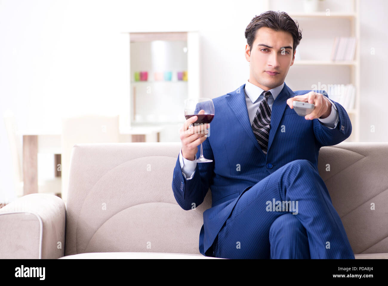 Changing channels businessman hi-res stock photography and images - Alamy