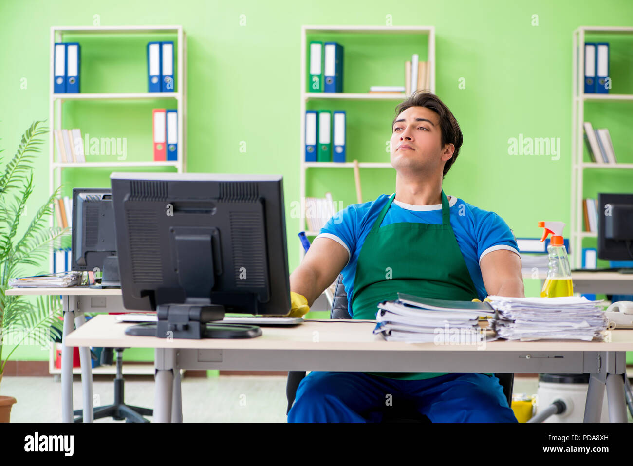 Hacker under professional cleaner cover stealing personal data Stock ...