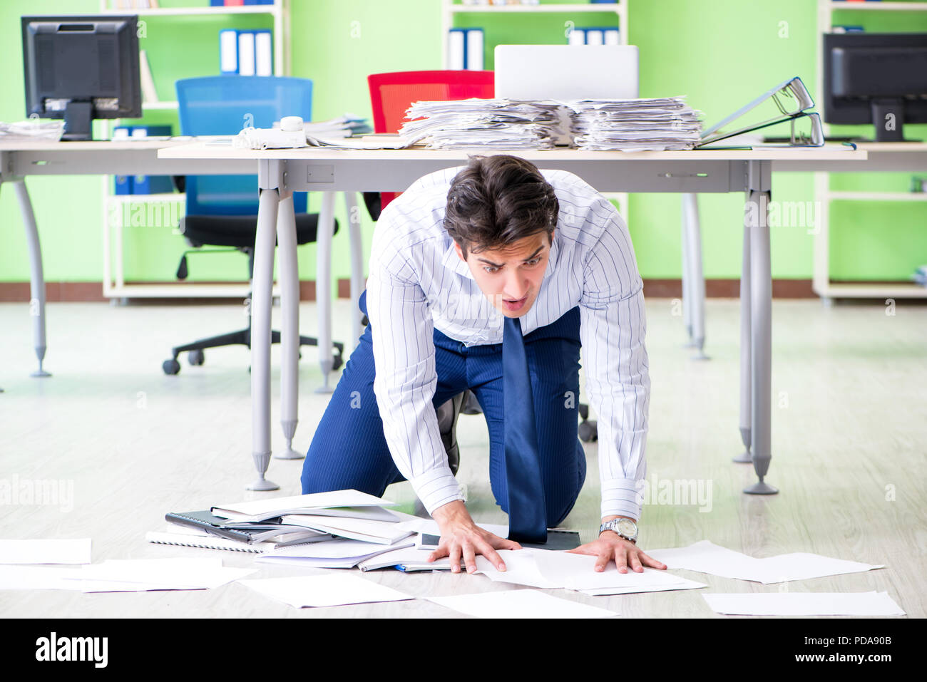 Frustrated businessman stressed from excessive work Stock Photo - Alamy