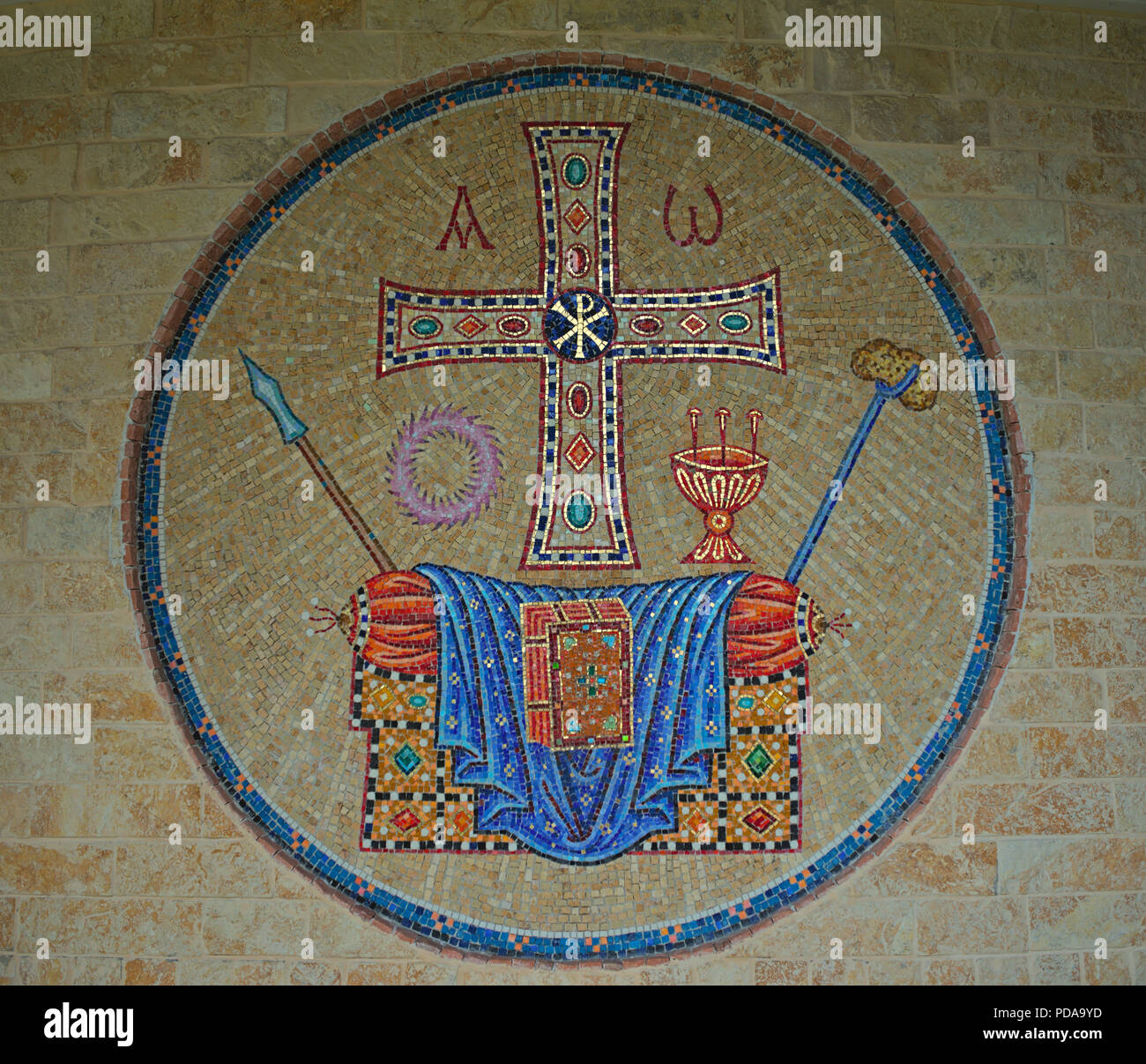 Mosaic on stone wall with christian symbols Stock Photo - Alamy