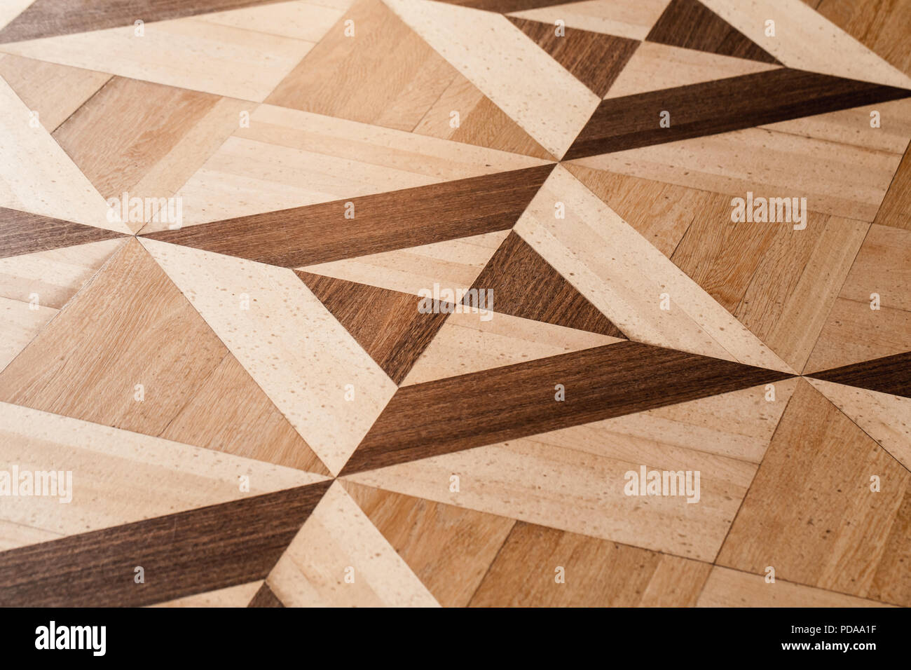 Classical wooden parquet design, geometric pattern with triangles and ...