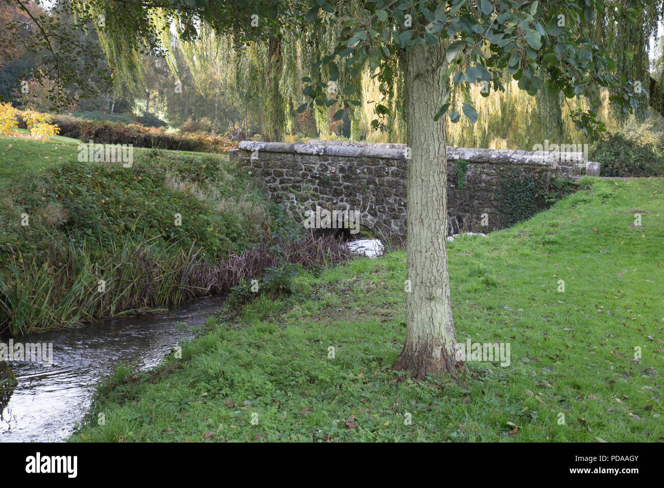 river running under a stone bridge Stock Photo - Alamy