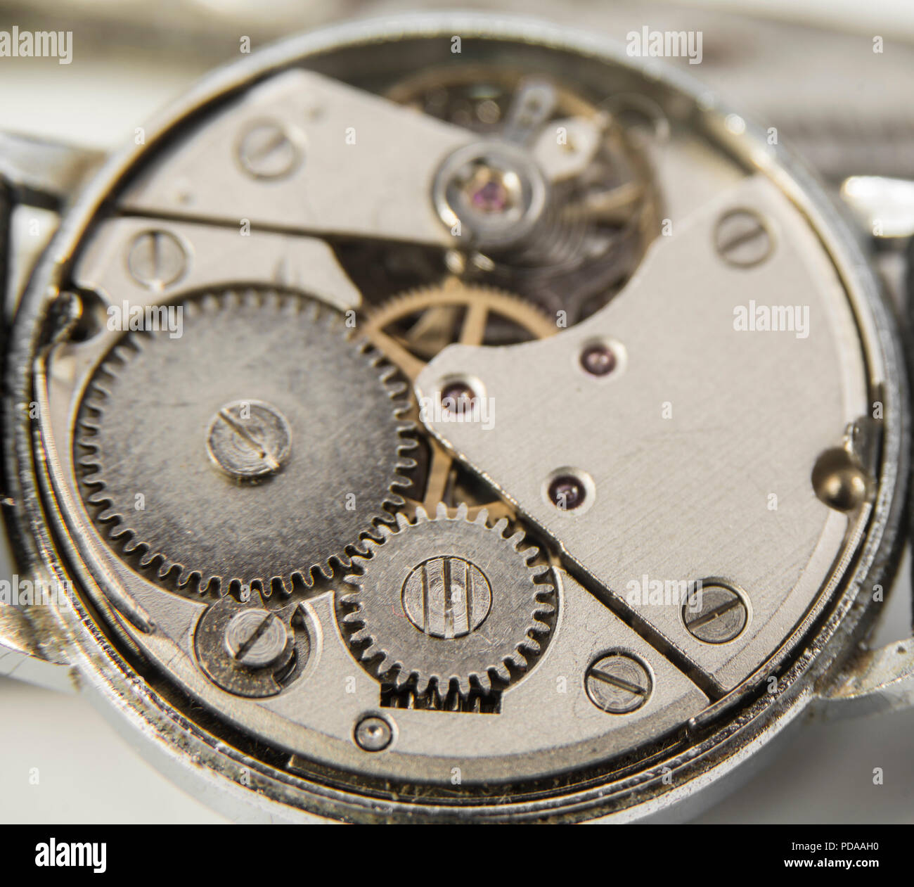 Opened back of vintage watch machinery, macro detail Stock Photo - Alamy