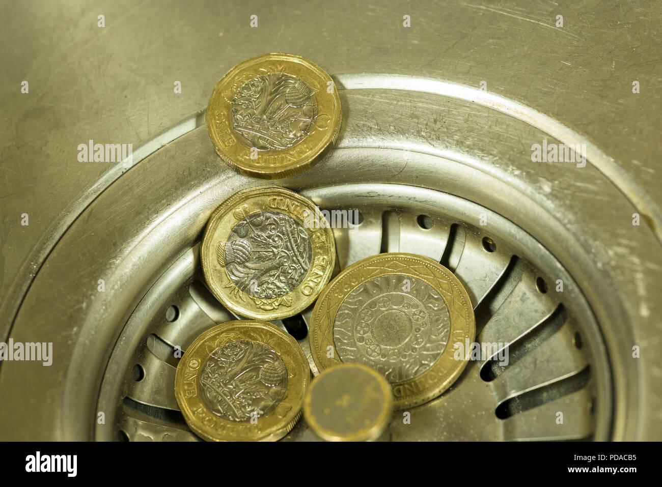 Throwing Money Down The Drain High Resolution Stock Photography and ...