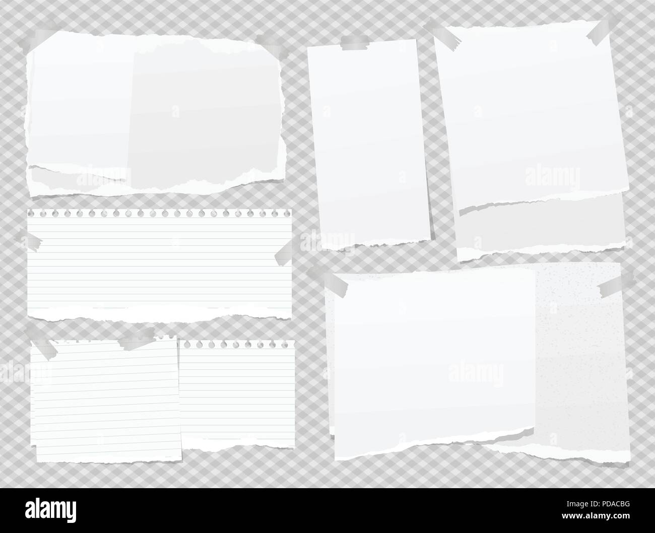White lined note, notebook paper pieces with torn edges stuck with ...