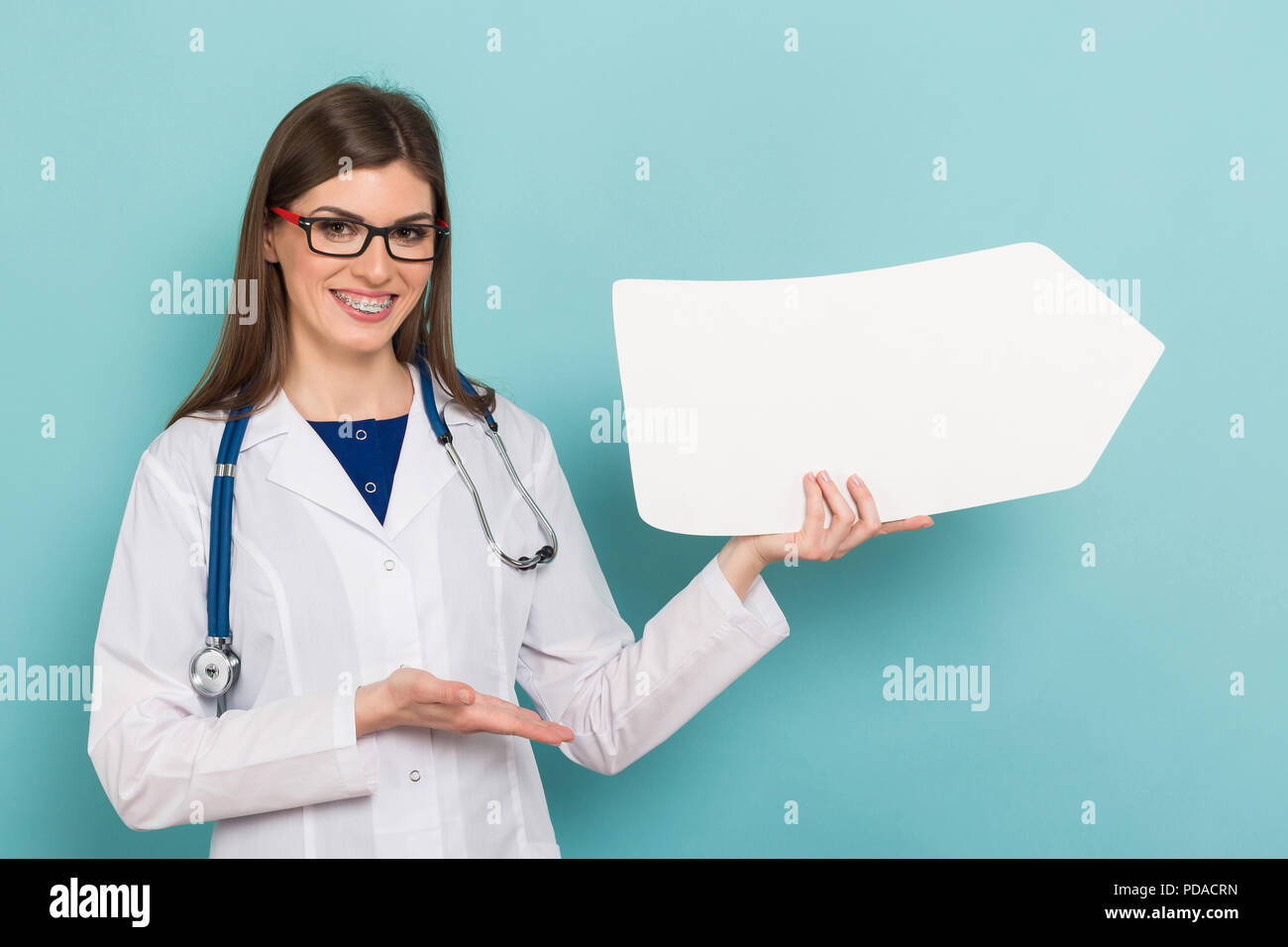 Female doctor with paper pointer Stock Photo - Alamy