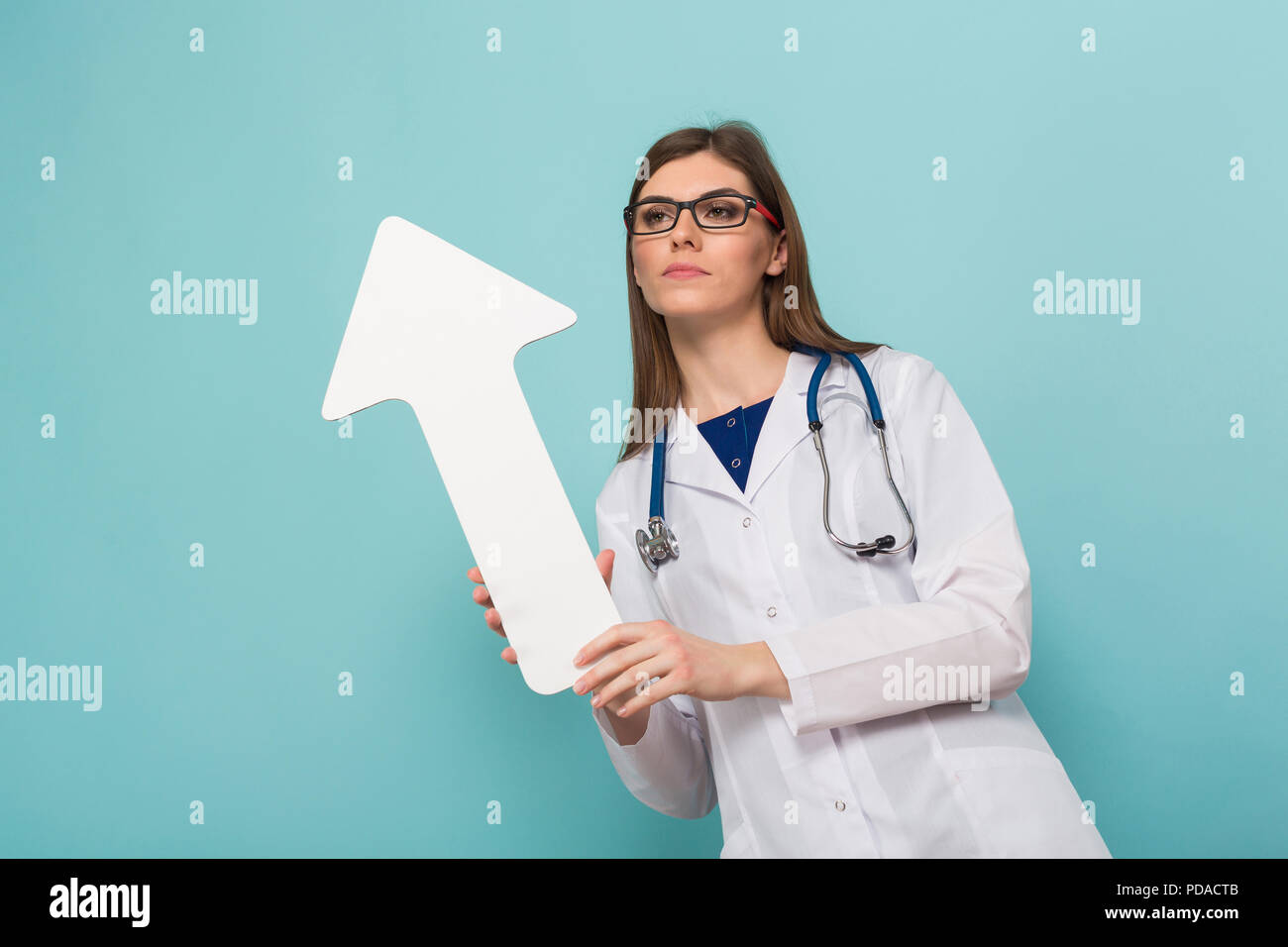 Female doctor with paper pointer Stock Photo - Alamy