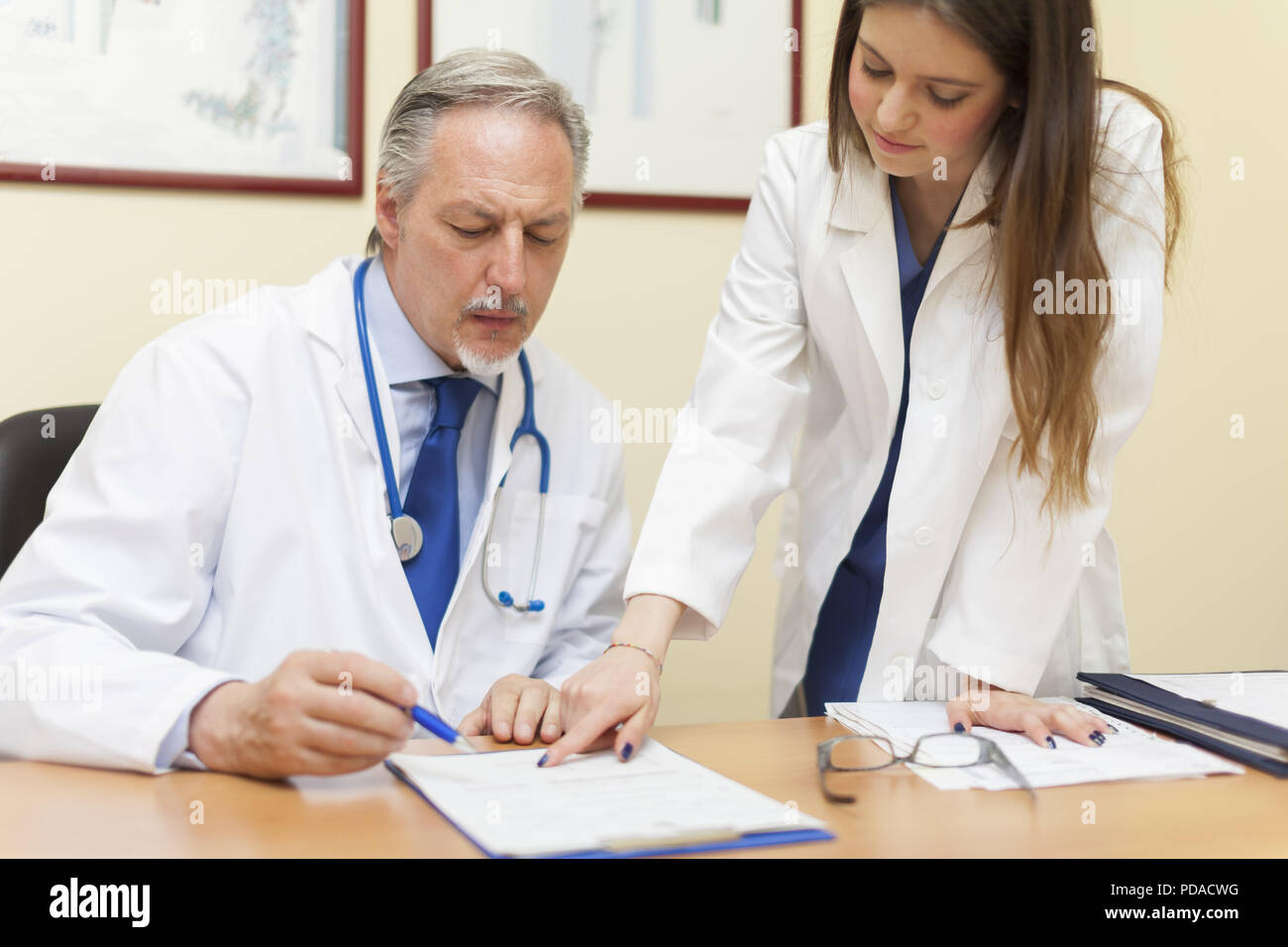 Doctors at work in their studio Stock Photo - Alamy