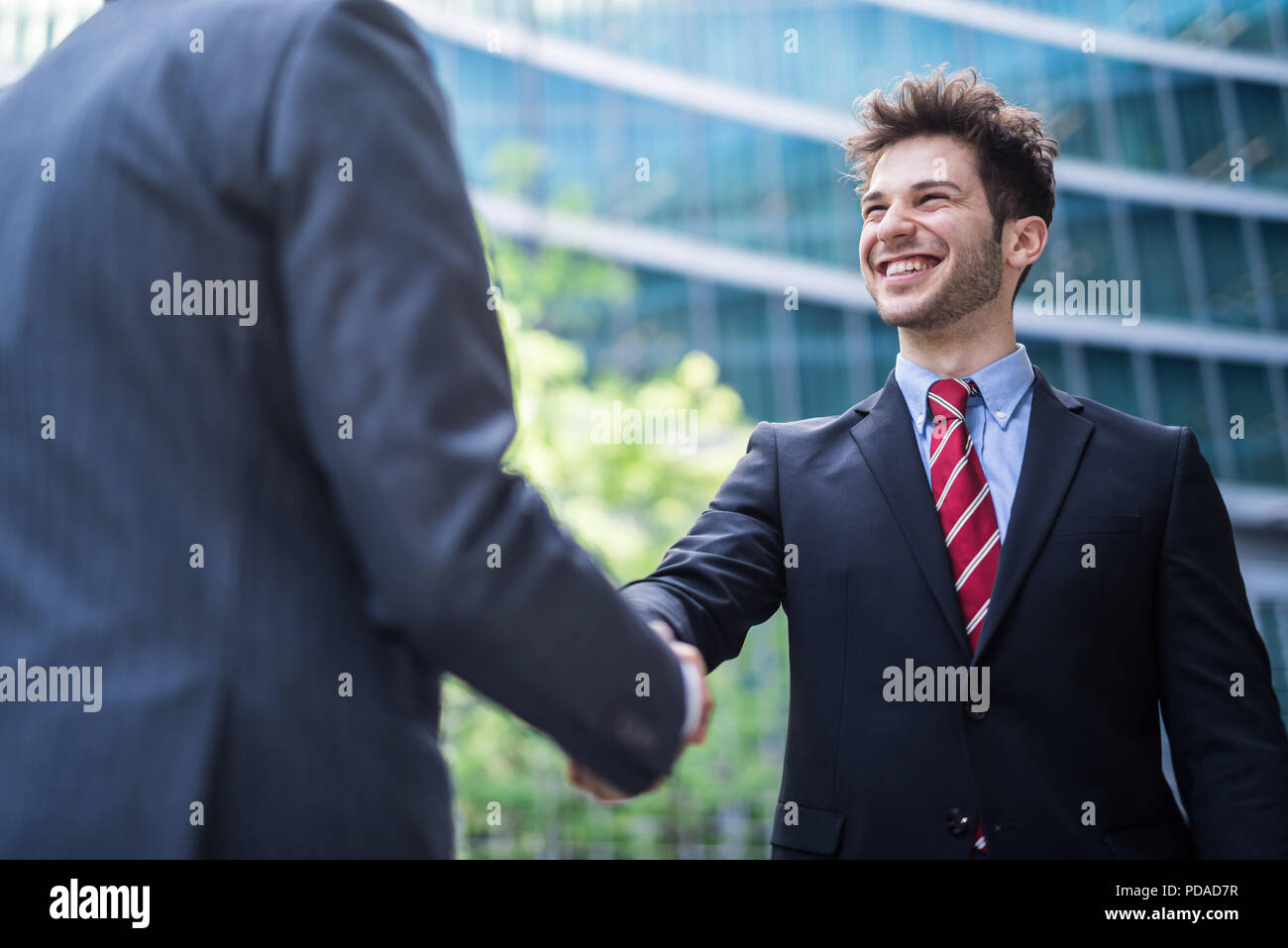 Business meeting hand shaking blur hi-res stock photography and images ...