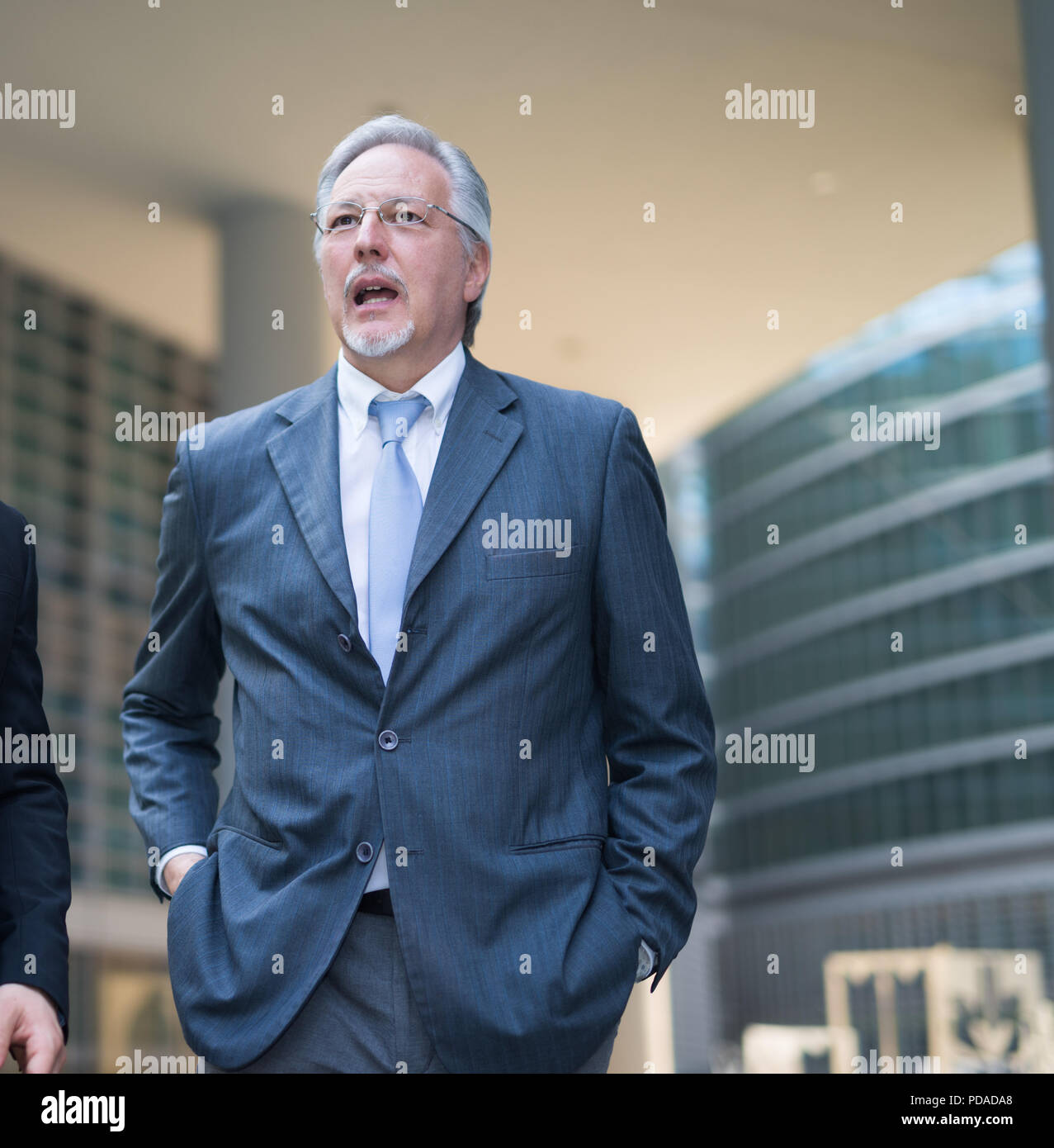 Outdoor portrait of a confident senior executive Stock Photo - Alamy