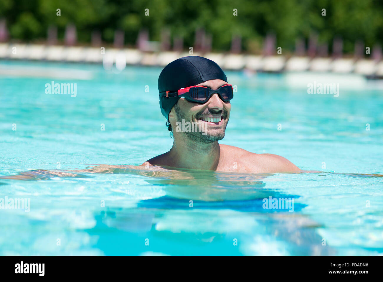 Man swimming in a pool Stock Photo - Alamy