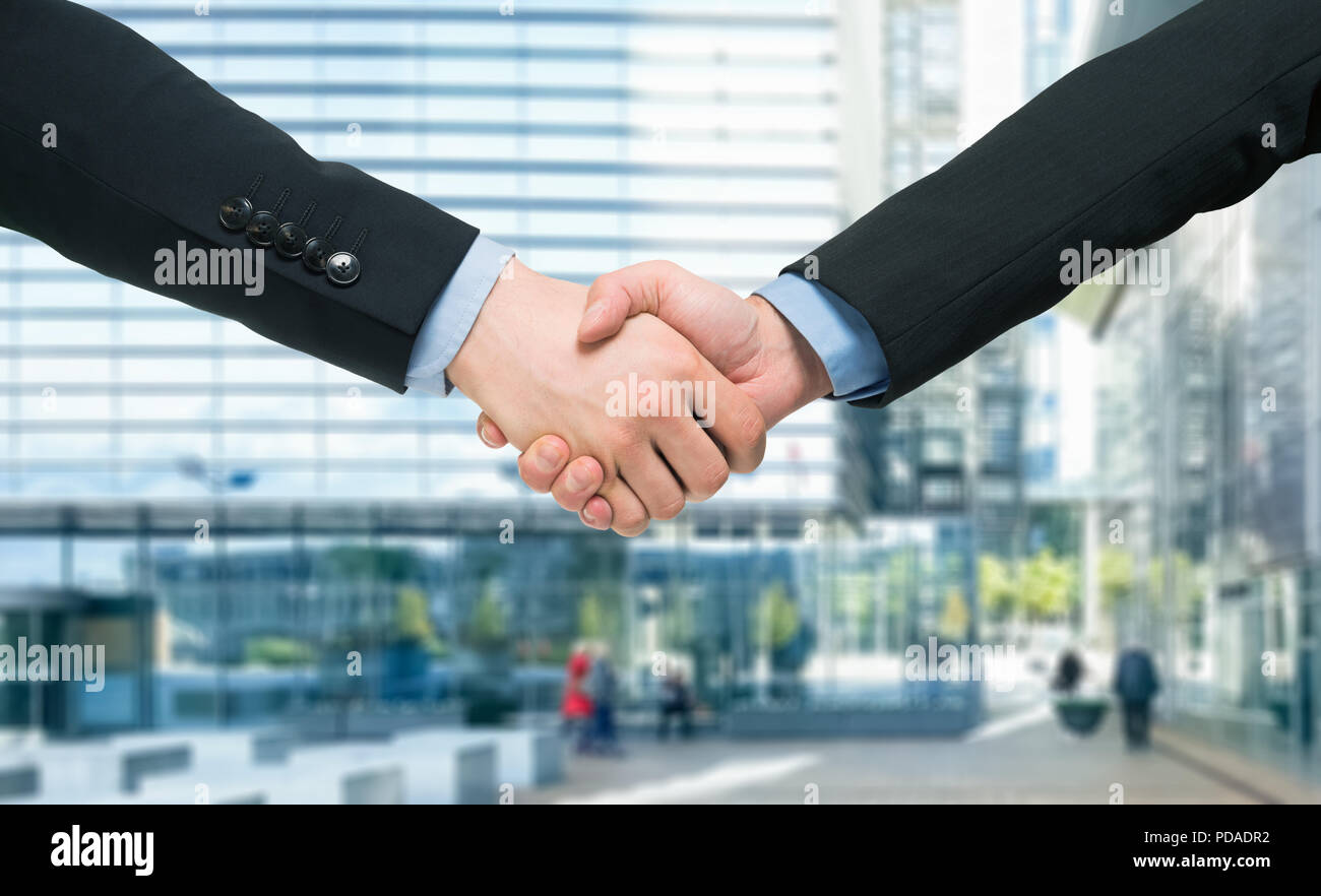 Handshake between business people Stock Photo - Alamy