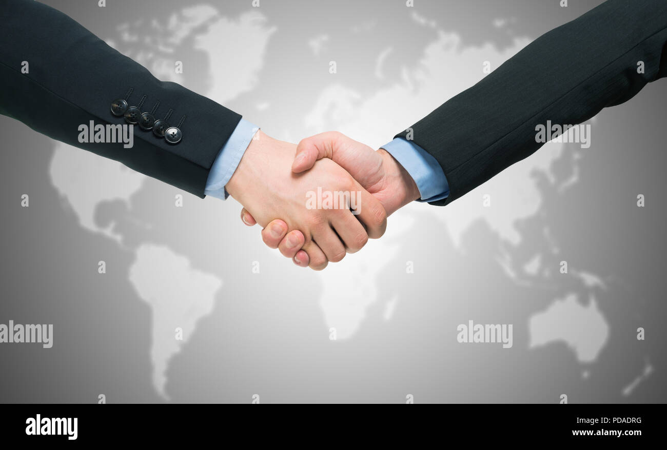 Shake hands world map hi-res stock photography and images - Alamy
