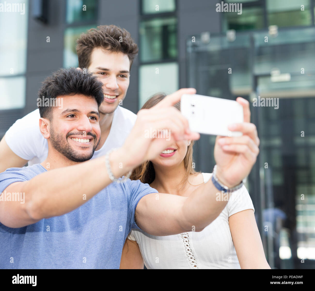 Group of friends taking a selfie Stock Photo - Alamy