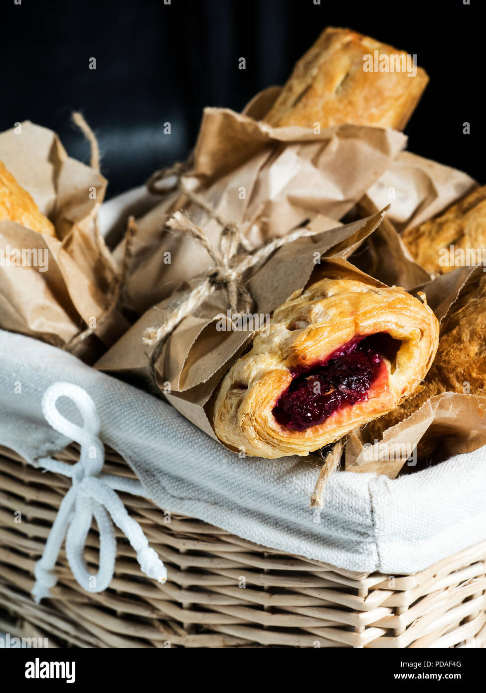 rolls of puff pastry with fruit jam Stock Photo - Alamy