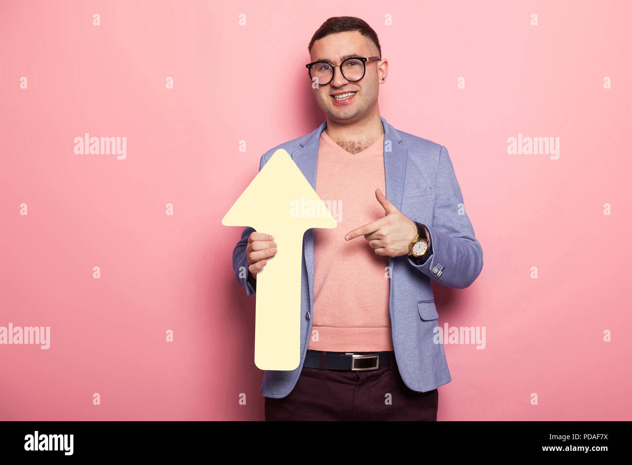 Handsome man in bright jacket with speech pointer Stock Photo - Alamy