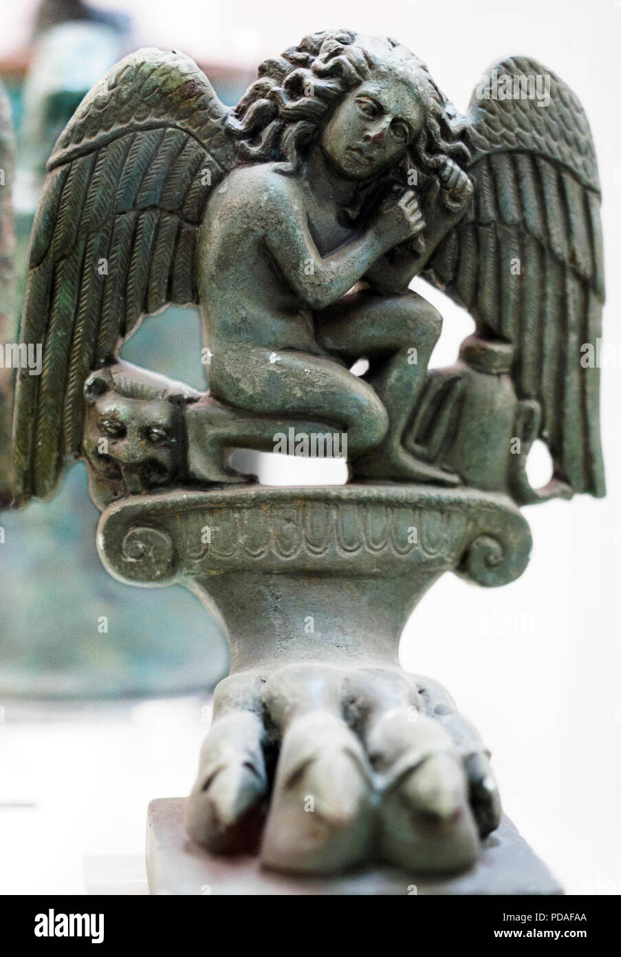 Foot of feral-leg cistus with female winged genius combing. 4th-3rd ...