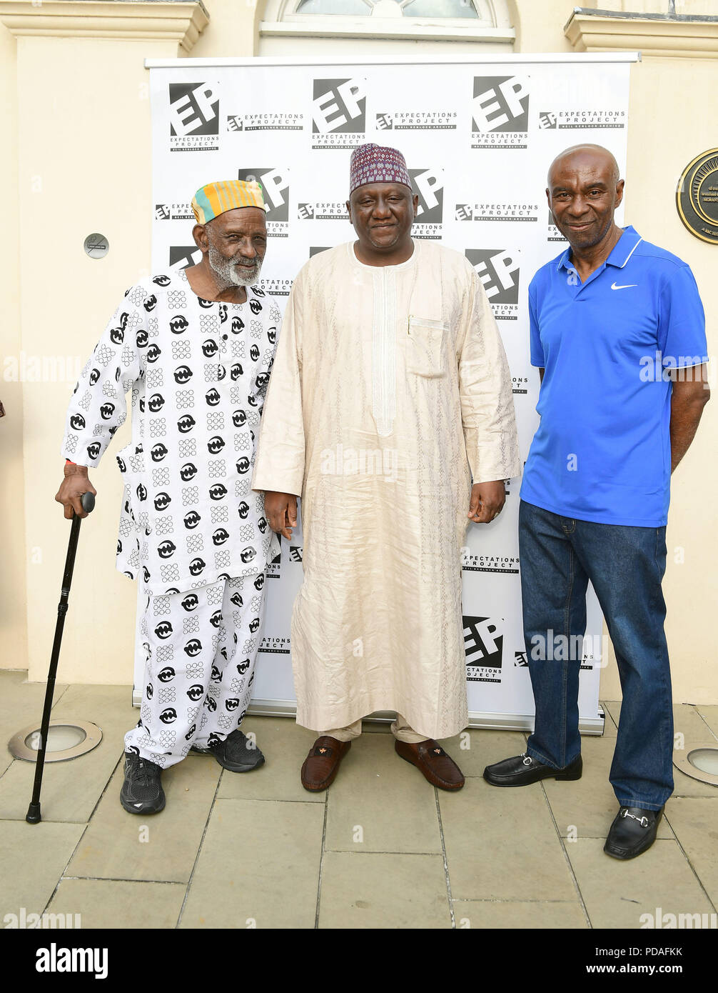 (Left to right) James Banor, His Royal Highness Shah Usman- Yamusa and ...