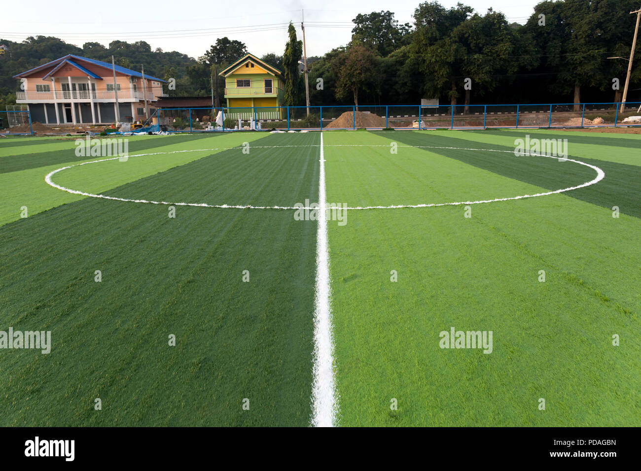 New soccer field with light and dark green artificial grass Stock Photo ...