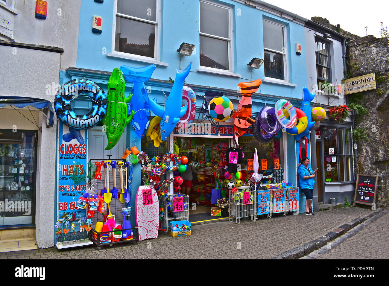 A colourful display of goods at a traditional seaside gift shop in ...