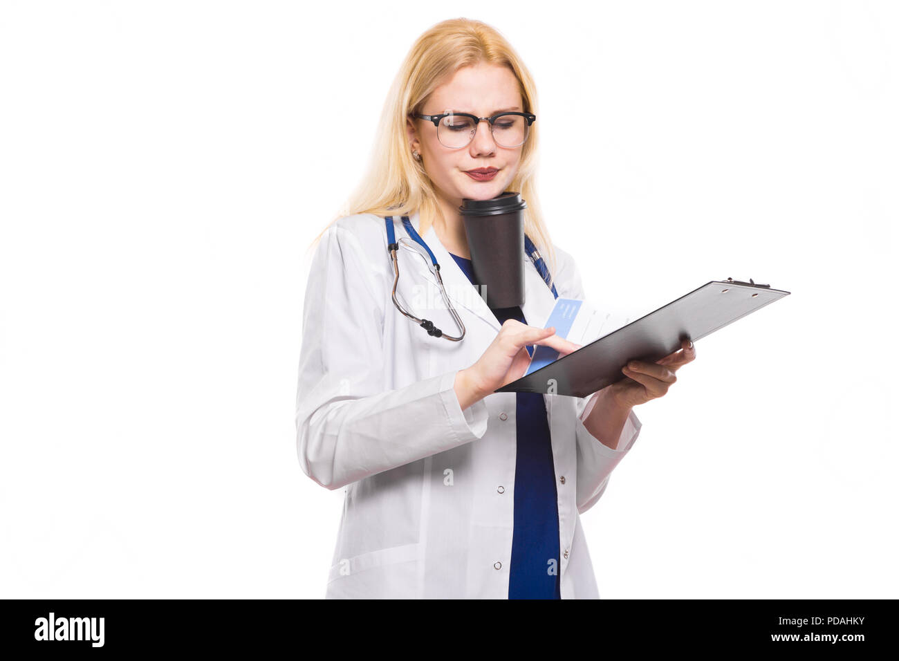 Woman doctor with stethoscope and clipboard Stock Photo - Alamy