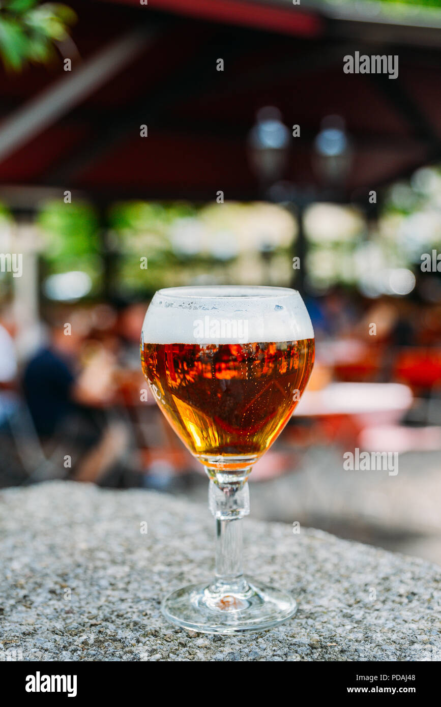 Cold beer glass on at beer garden Stock Photo - Alamy