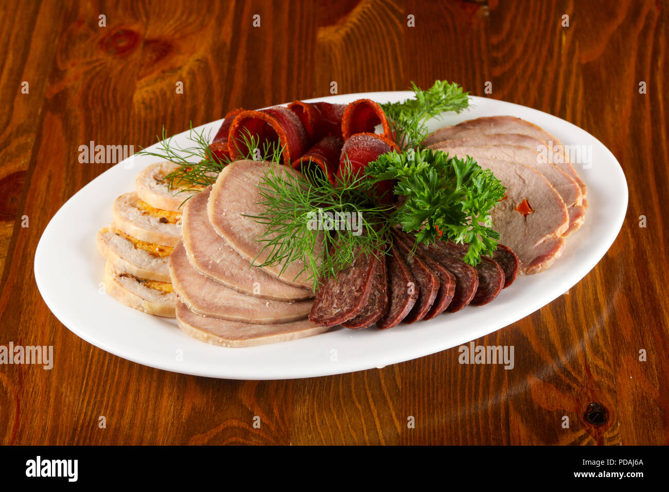 Meat plate - tongue, beef, chicken Stock Photo - Alamy