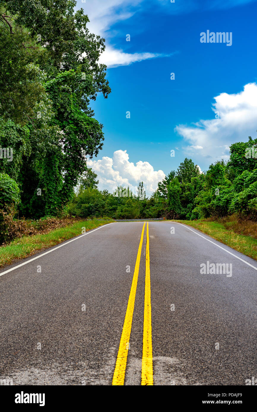 A rural Alabama highway stretches into the horizon, beckoning the nomad ...