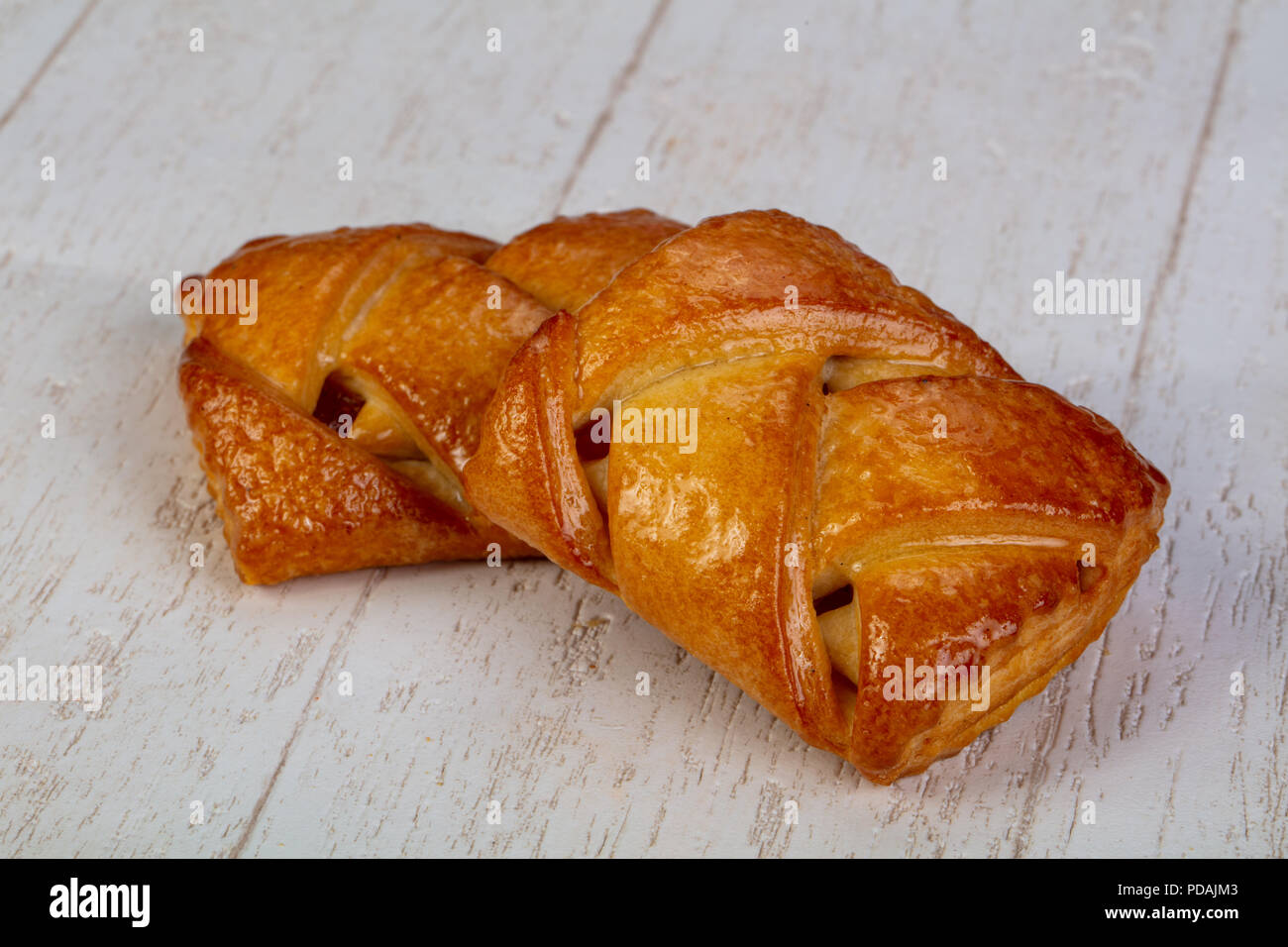 Delicious puff pastry strudel with jam Stock Photo - Alamy
