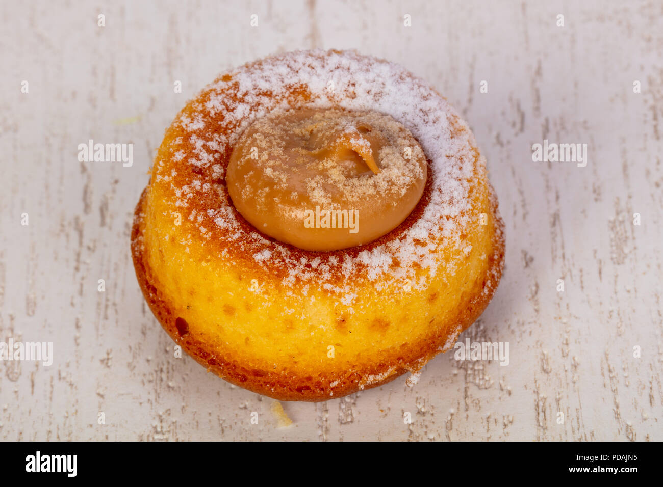 Sweet tasty cookies ower wooden background Stock Photo - Alamy