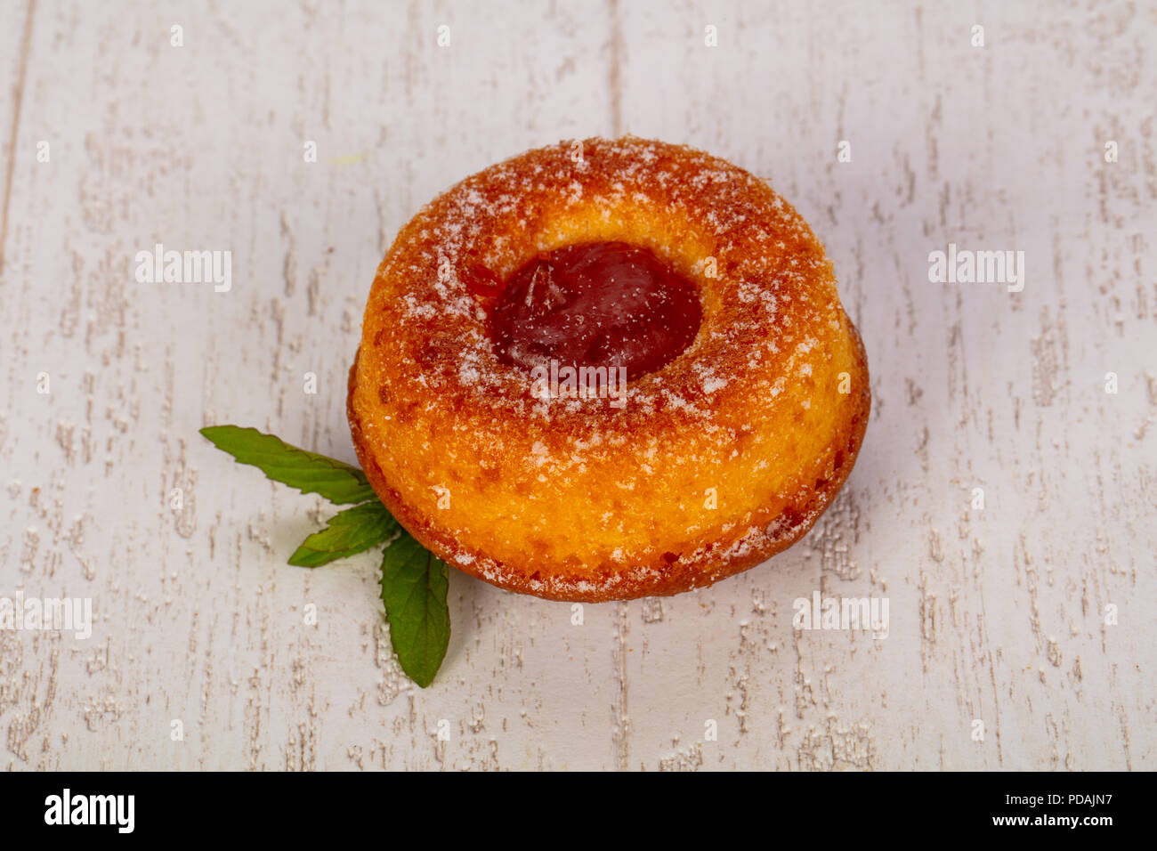 Sweet tasty cookies ower wooden background Stock Photo - Alamy