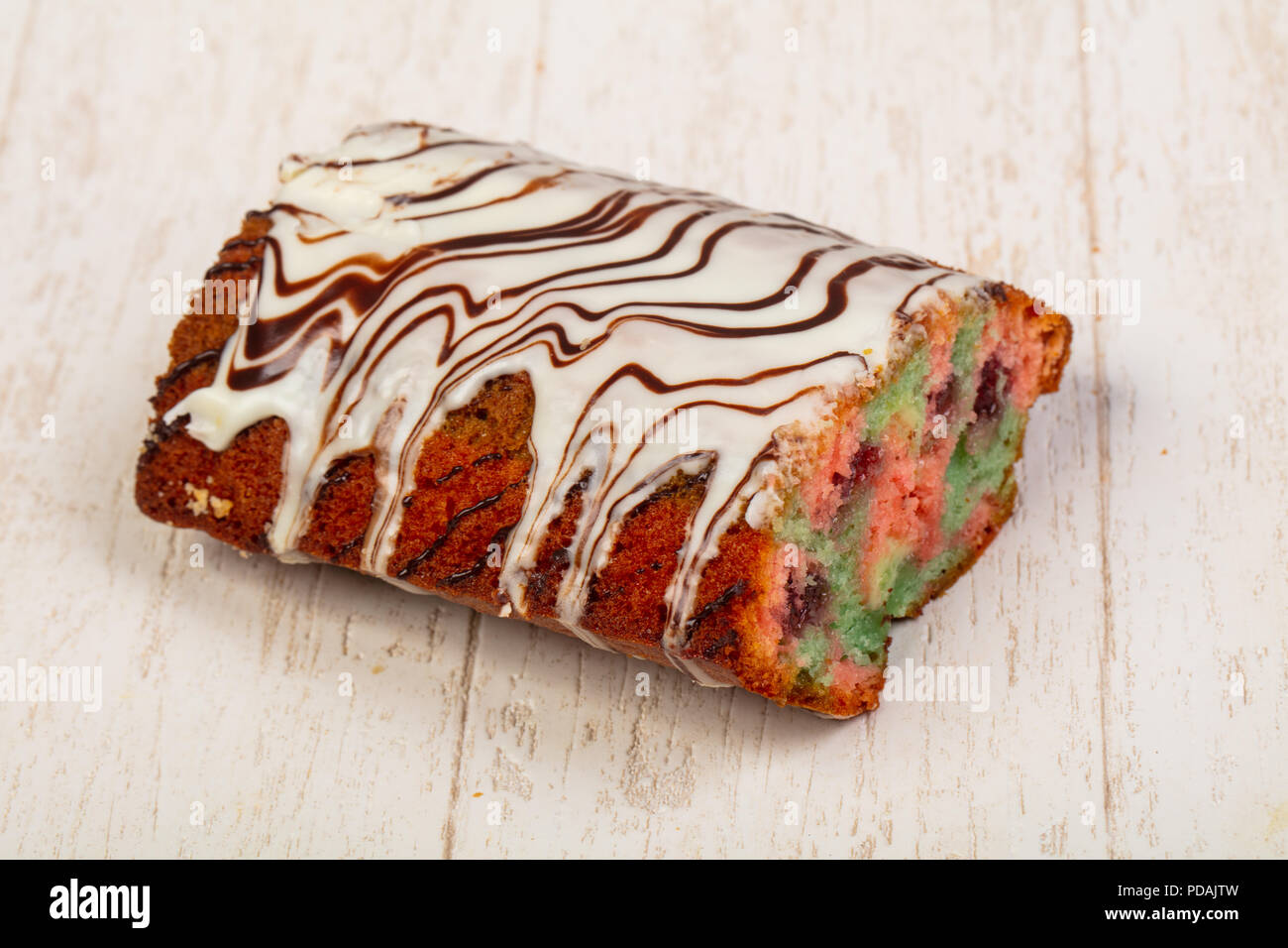 Tasty delicous cake over wooden background Stock Photo - Alamy