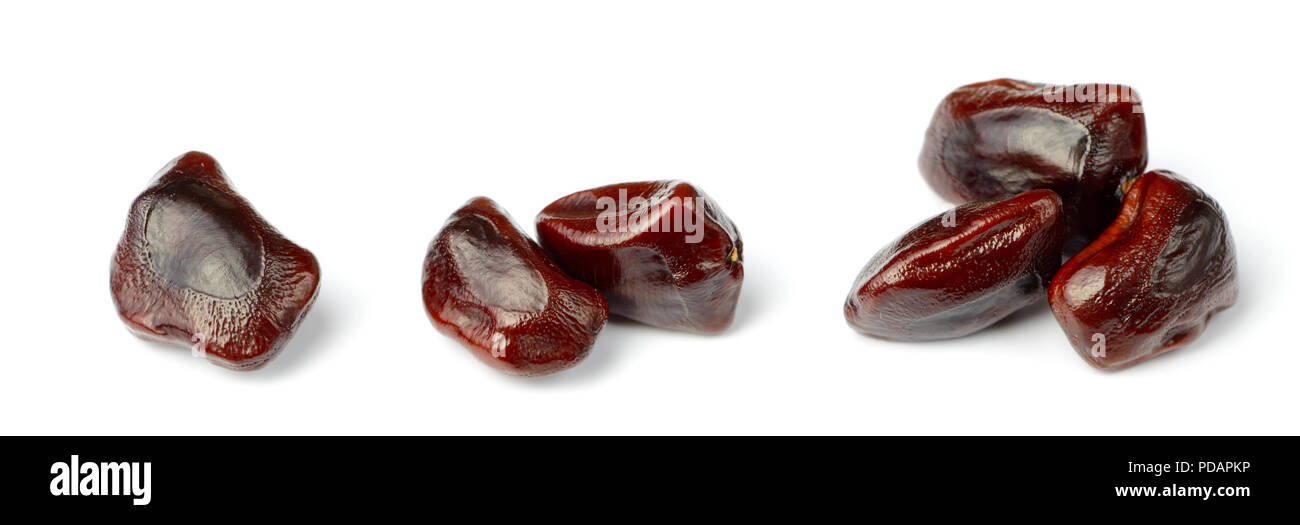 tamarind seeds isolated on the white background Stock Photo - Alamy