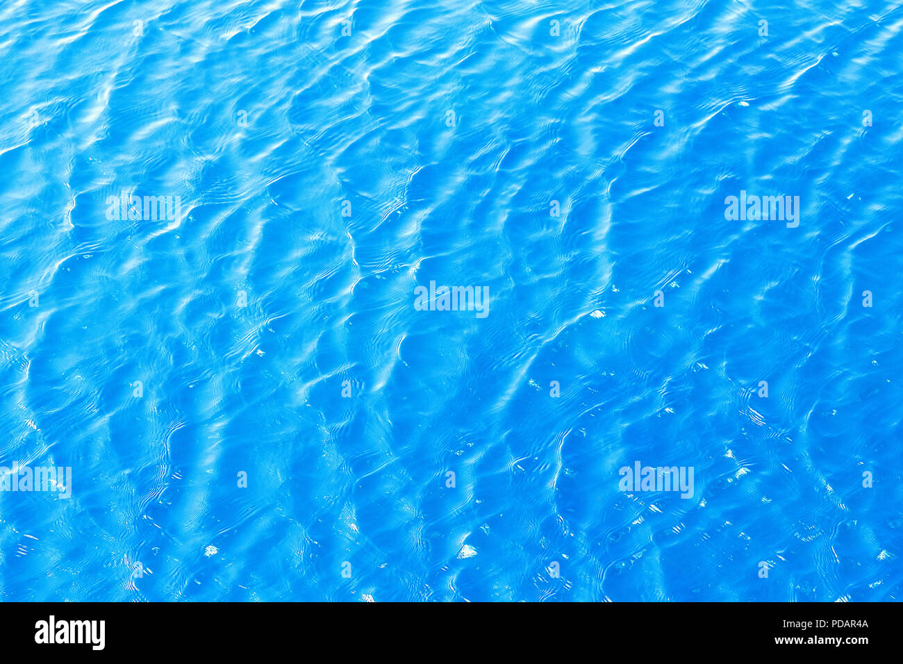Shining blue wavy water surface ripple background, backdrop Stock Photo ...