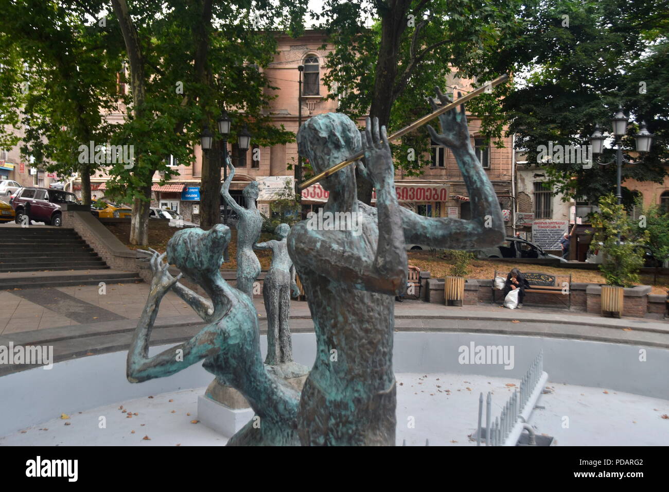 Statue flute player hi-res stock photography and images - Alamy
