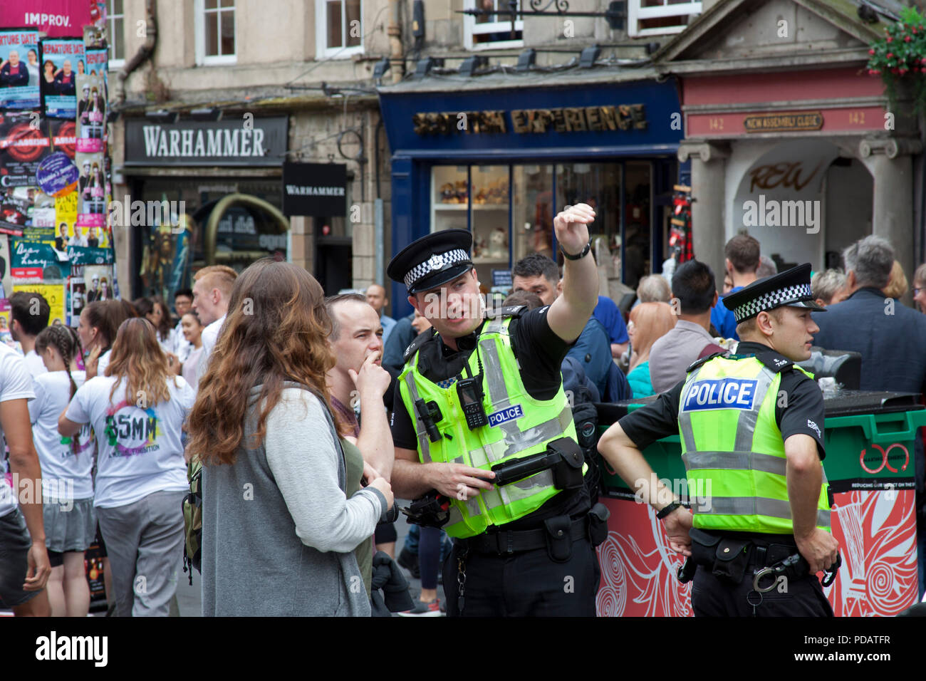 Policeman giving directions hi-res stock photography and images - Alamy