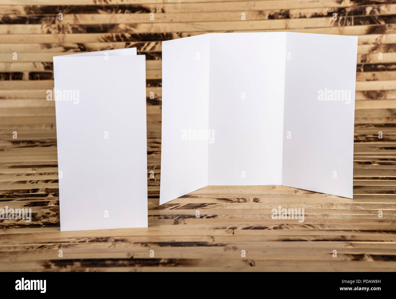 Mockup of white booklet on bamboo background Stock Photo - Alamy